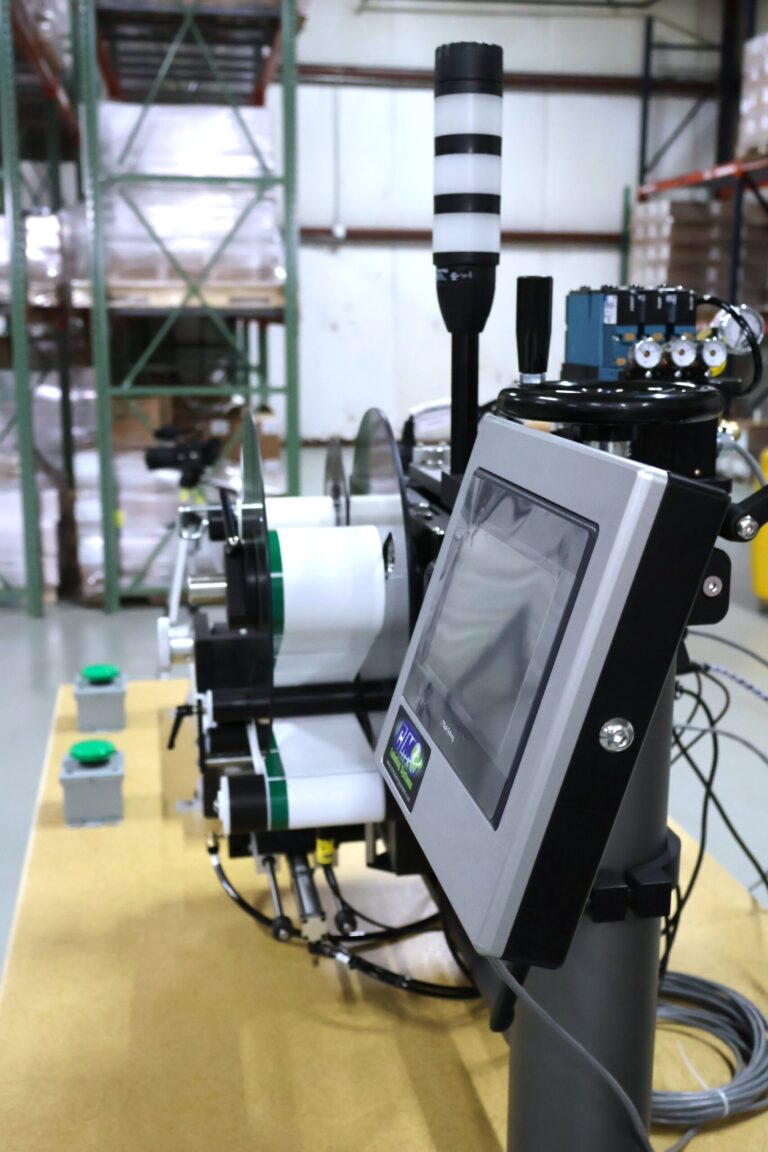Semi-Automatic Label Applicator for Medical Supplies - EMP Tech Group